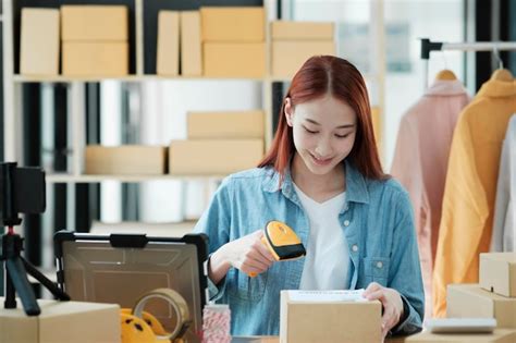 Premium Photo Scanning Barcode On Shipping Box With Scanner