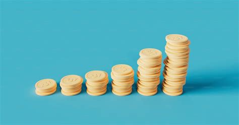 파란색 표면 위에 놓인 동전 더미 사진 Unsplash의 투자 이미지