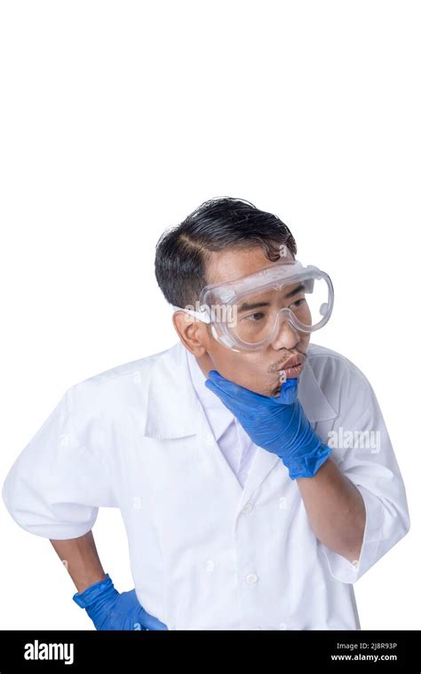 Asian Nerd Scientist Standing And Thinking Something Isolated Over White Background Stock Photo