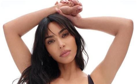 Watch Kim Kardashian Flaunt Her Chest In Black Low Cutout Dress