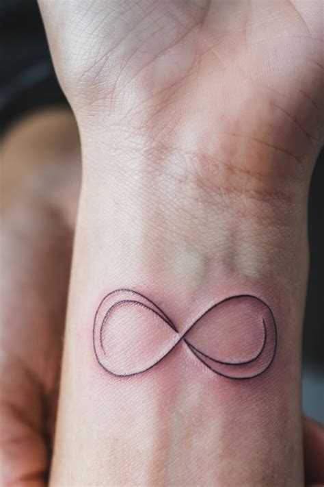 25 Elegant Infinity Symbol Wrist Tattoos For Women Timeless Ideas