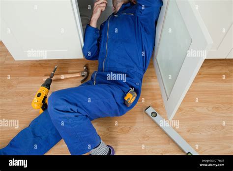 Repair Man Fixing Something Stock Photo Alamy