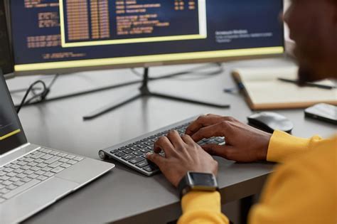 Premium Photo Close Up Of Unrecognizable Black Man Typing At Keyboard
