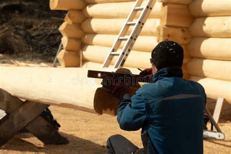 Build A House From Logs Preparation Of Logs For The Assembly Of The Structure Assembly Of A