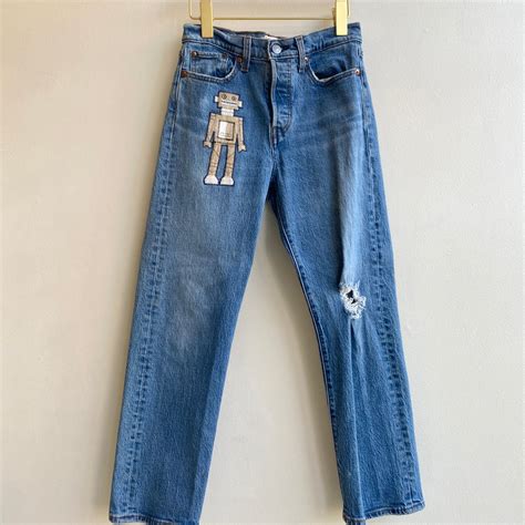robot hand patched and embroidered jeans reworked made x hudson