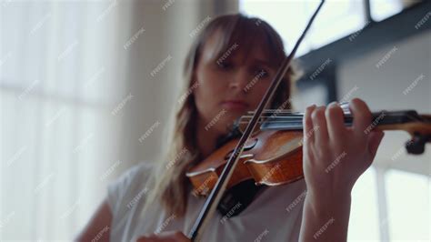 Premium Photo Girl Practicing Music On Violin Violinist Creating Song