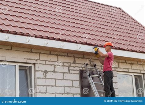 Installation Of Gutter System Stock Image 96841423