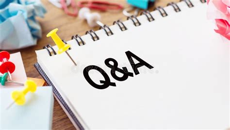 A Notepad With The Words Q And A Written On It Symbolizing Questions
