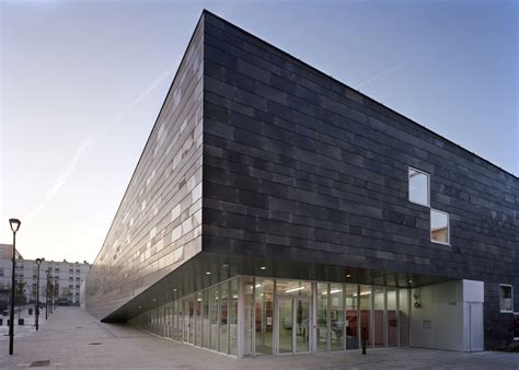 Sports Complex By Archi5 And Tecnova Architecture With A Basalt Facade
