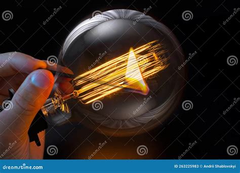 a man stands on the planet in front of a big question mark the concept