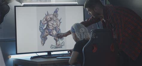 Game Developers Discussing Game Art Stock Photo Image Of Ideas Female