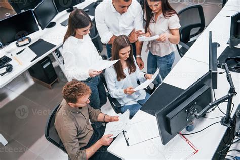Group Of Young Business People That Working By Computers In The Modern