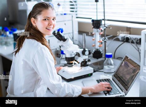 Portrait Of A Female Chemistry Babe Carrying Out Research In A Chemistry Lab Color Toned