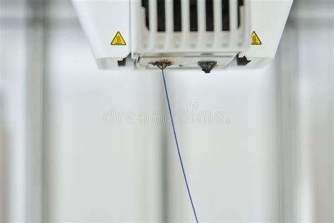 Blue Plastic Filament Extruding Through 3d Printer Nozzle Stock Image Image Of Injector