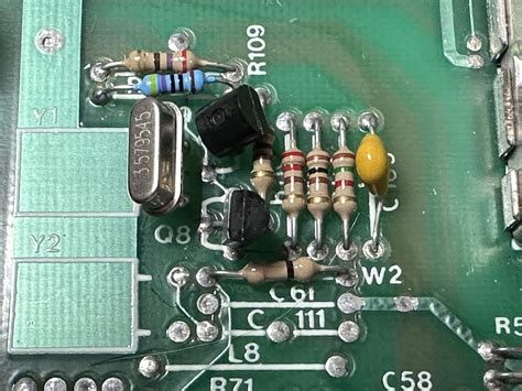 diagnose and repair the crystal clock oscillator circuit in an atari 8