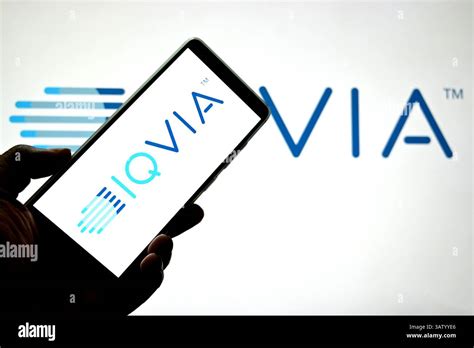 In This Photo Illustration An Iqvia Logo Is Seen Displayed On A