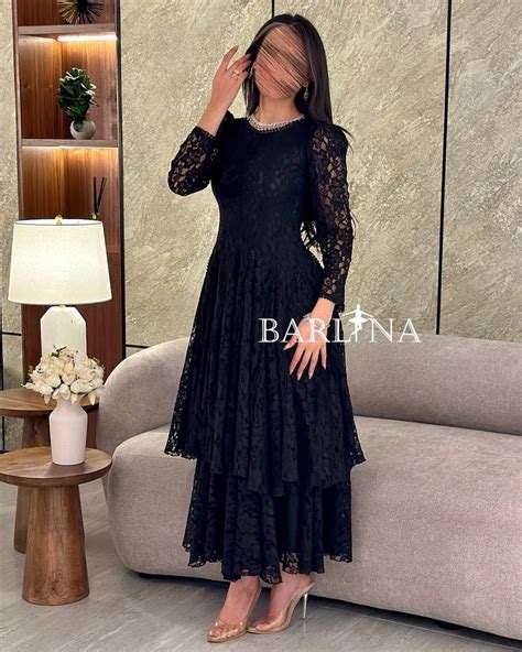 فستان سهرة عنابي مع دانتيل اسودمتجر بارلينا Barlina