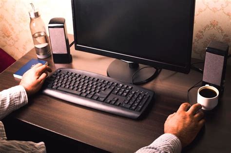 Premium Photo Male Hands Are Typing On A Computer