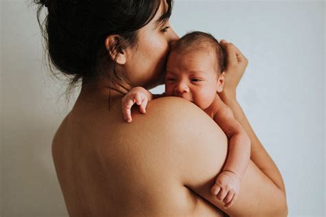 Mother Holding Her Infant Baby Premium Photo Rawpixel