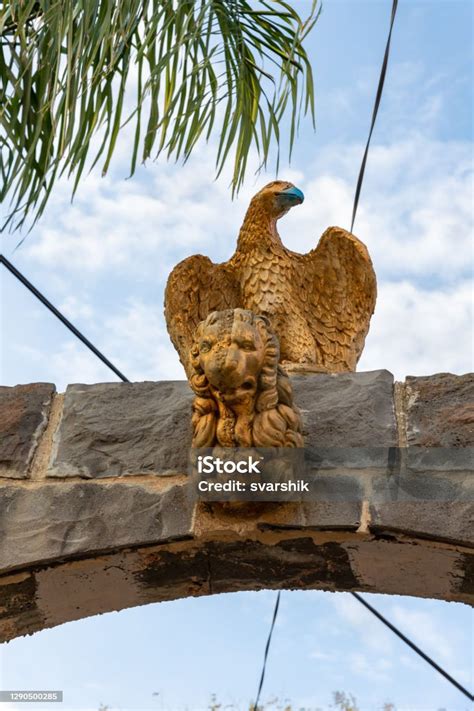 Gilded Figures Of An Eagle And A Lions Head Above The Gate In The Muslim Circassian Adyghe