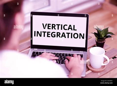 Text Caption Presenting Vertical Integration Business Concept Merger Of Companies At Different