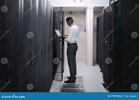 Digital Security Is Of The Utmost Importance A Young Male Technician Working In A Server Room