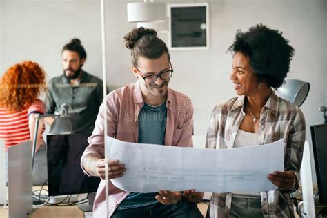 Architect Team Meeting With Blueprint Planning For Construction Business Project Collaboration