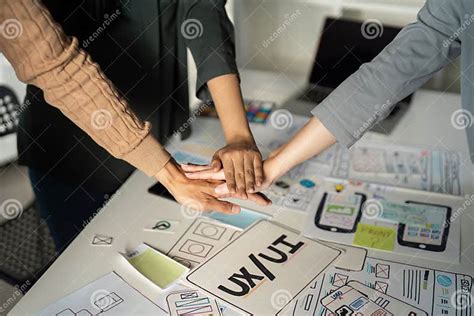 Collaborative Ux Ui Design Teamwork With Wireframes And Prototypes In A Modern Office
