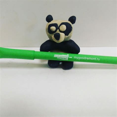 Панда из пластилина держит эко ручку Skateboard Sport