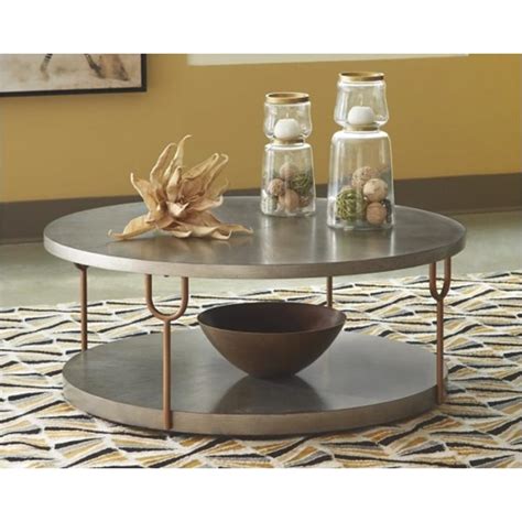 T178 8 Ashley Furniture Ranoka Round Cocktail Table