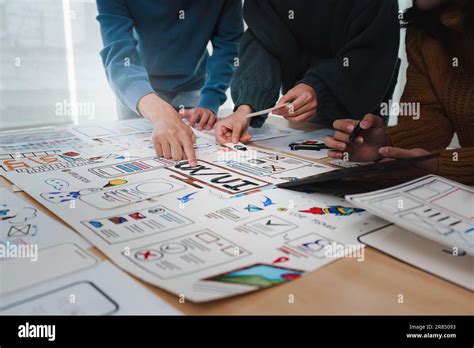 Close Up Ux Developer And Ui Designer Brainstorming Interface Wireframe Designcreative Digital