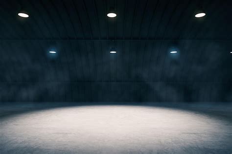 스포트라이트와 콘크리트 바닥 자동차 배경 및 빈 무대 개념 3d 렌더링 모형이 있는 측면 보기 어두운 스모키 차고 인테리어
