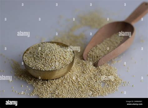 Close Up Of Wholesome Proso Millet Presented In A Golden Brass Bowl