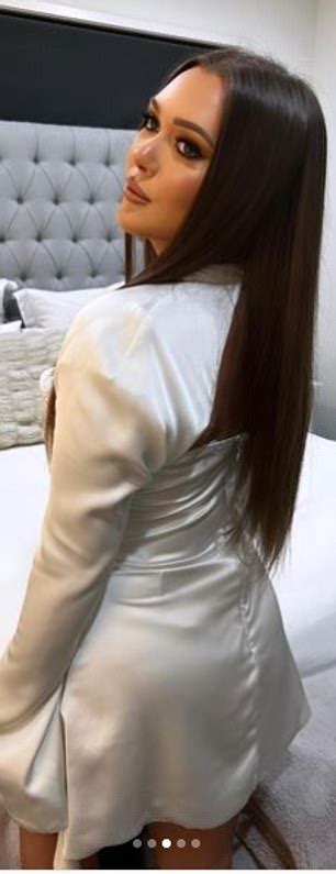 Dhakota Williams Slips Into A Skimpy White Dress As She Poses Bedside