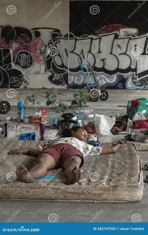 Homeless Girl Is Sleeping In The Abandoned Building Editorial