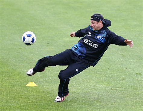 Nathan Mccullum Has A Go In A Game Of Football