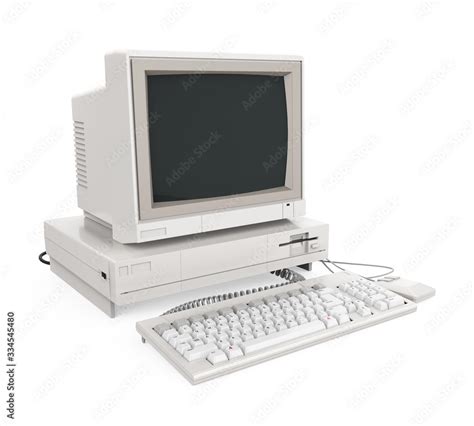 Old Desktop Computer With A Blank White Screen Monitor Keyboard And