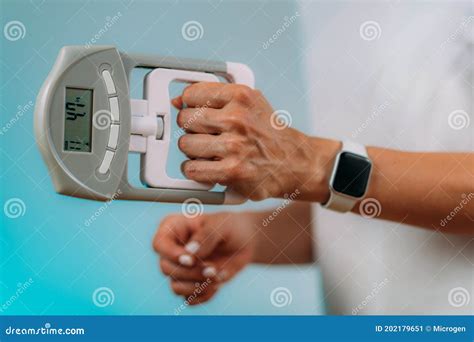 Using Hand Dynamometer For Grip Strength Test Stock Image Image Of Strength Device 202179651