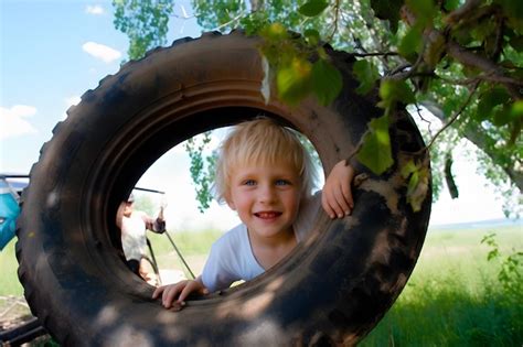 Premium Ai Image Young Girl On Tire Swing Neural Network Ai Generated