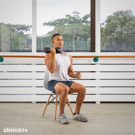 One Arm Seated Curl And Press R by Ömer Köseoğlu Exercise How to Skimble