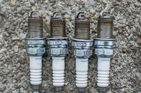 worn spark plugs to be replaced car consumable component stock image