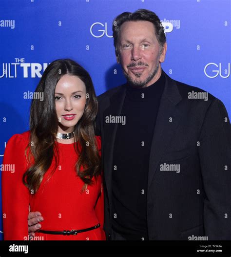 oracle ceo larry ellison and a guest attend the premiere of the motion