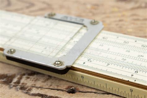 Logarithmic Ruler Pencil On A Wooden Table Stationery For Engineers Logarithmic Ruler Pencil On A Wooden Table Stationery For Engineers