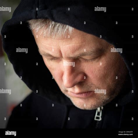 Man Looked Like Hacker In A Hood Looking At The Screen Stock Photo Alamy