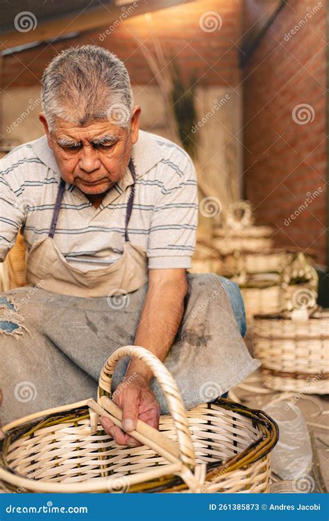 Latin American Old Man Placing Handle On His Wicker Basket Argentinian