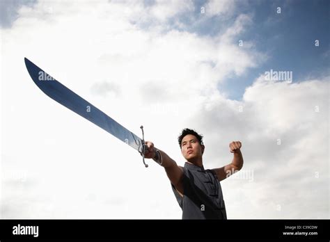 Chinese Man Pointing Sword Outside Hi Res Stock Photography And Images Alamy