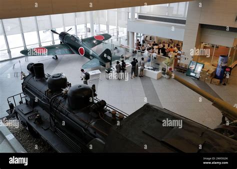 Jnr Class C56 Steam Locomotive No C56 31and A6m Zero Model 52 Fighter Aircraft Display In