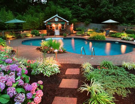 Transform Your Backyard With Stunning Pool And Landscape Design Ideas