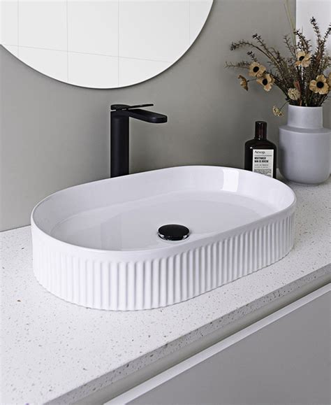 Architecturaldesigner Pill 580mm Fluted Above Counter Ceramic Basin