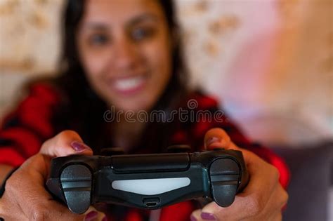 Unleashing Fun Woman S Delightful Gaming Experience With Console